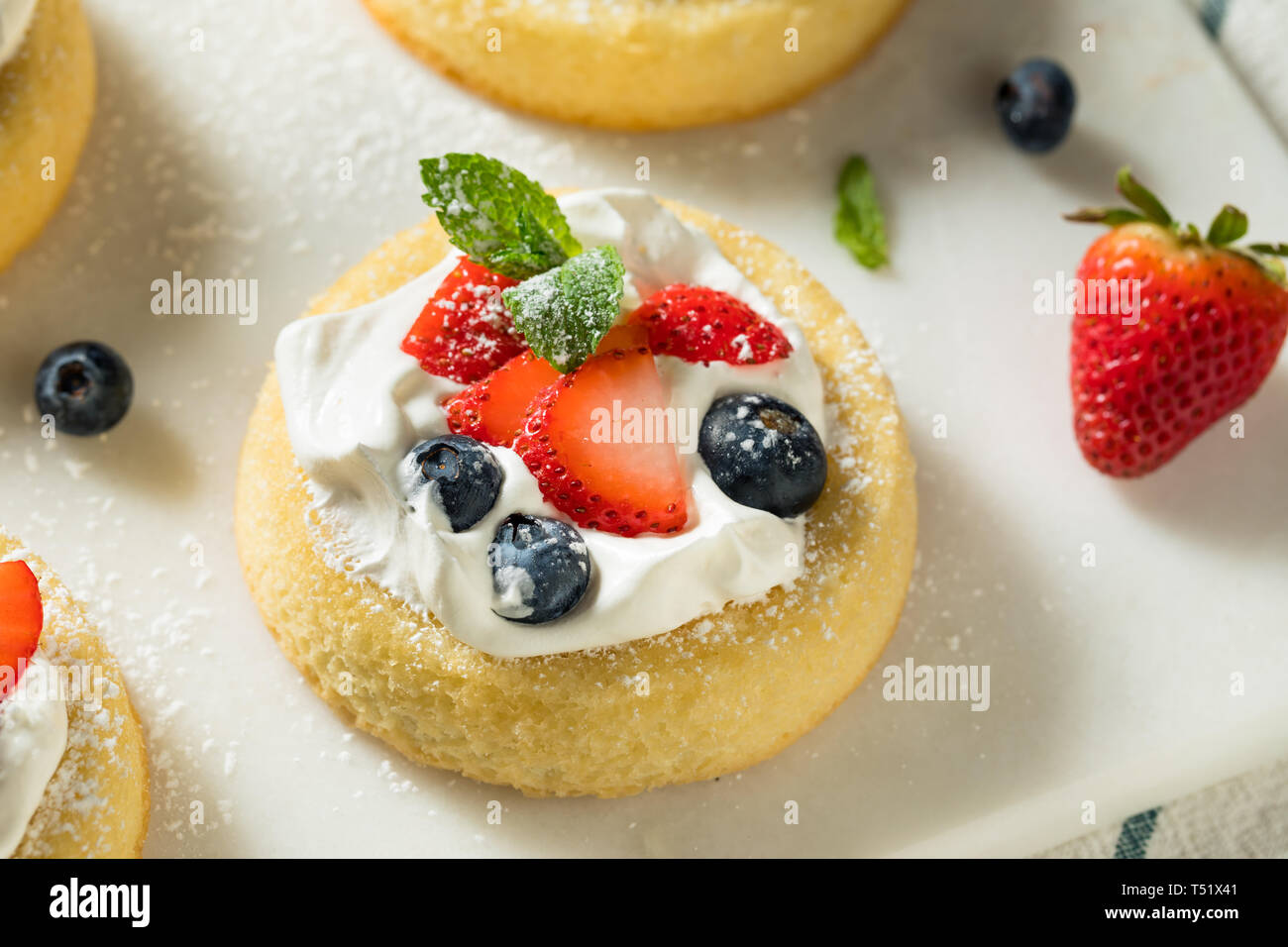 Homemade Mini Sponge Cake Cups with Fruit and Whipped Cream Stock Photo ...