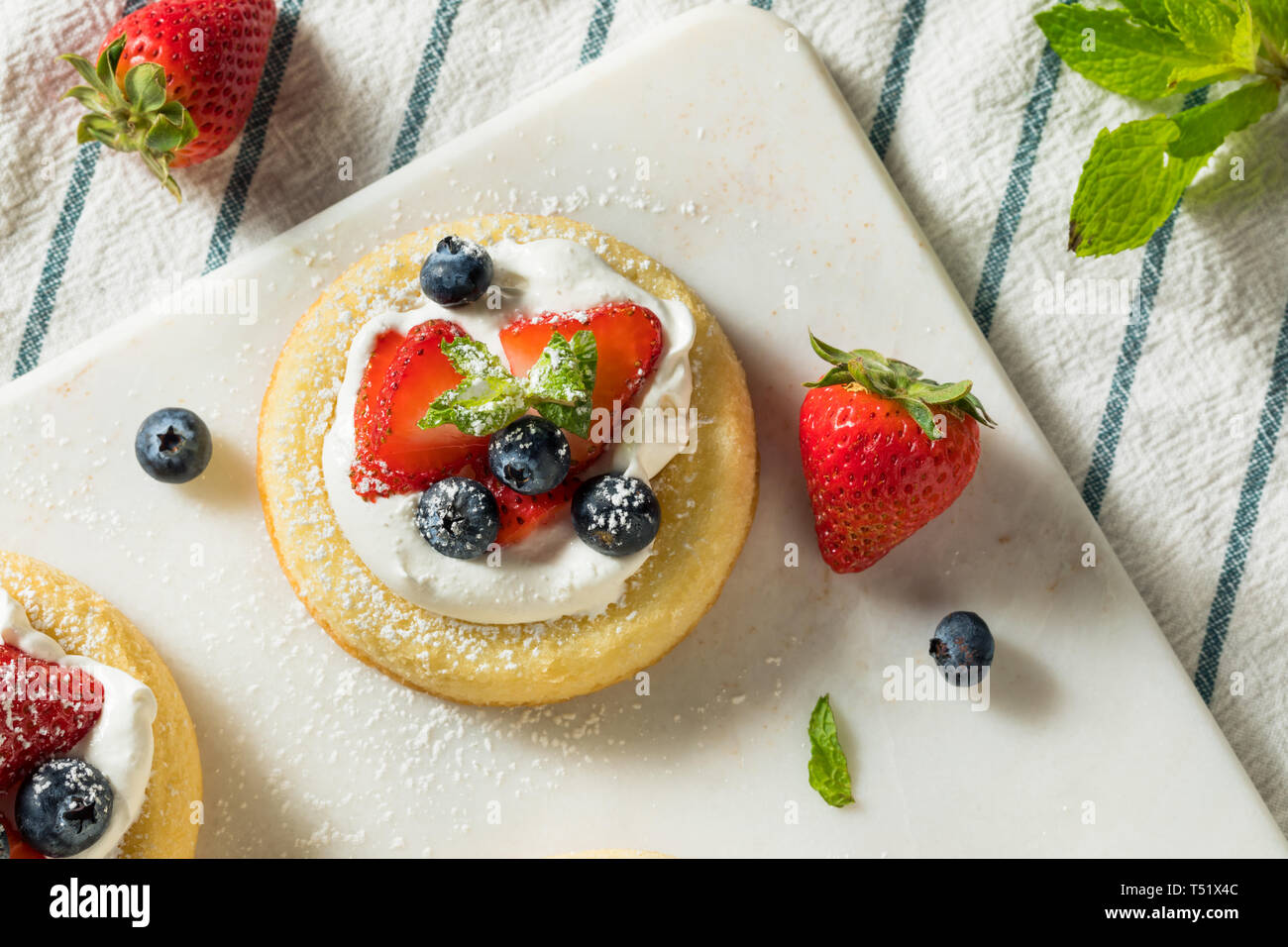 Homemade Mini Sponge Cake Cups with Fruit and Whipped Cream Stock Photo ...