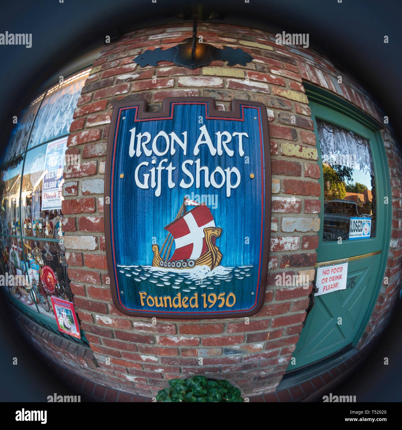 Hand crafted wooden store sign for gift shop Stock Photo - Alamy
