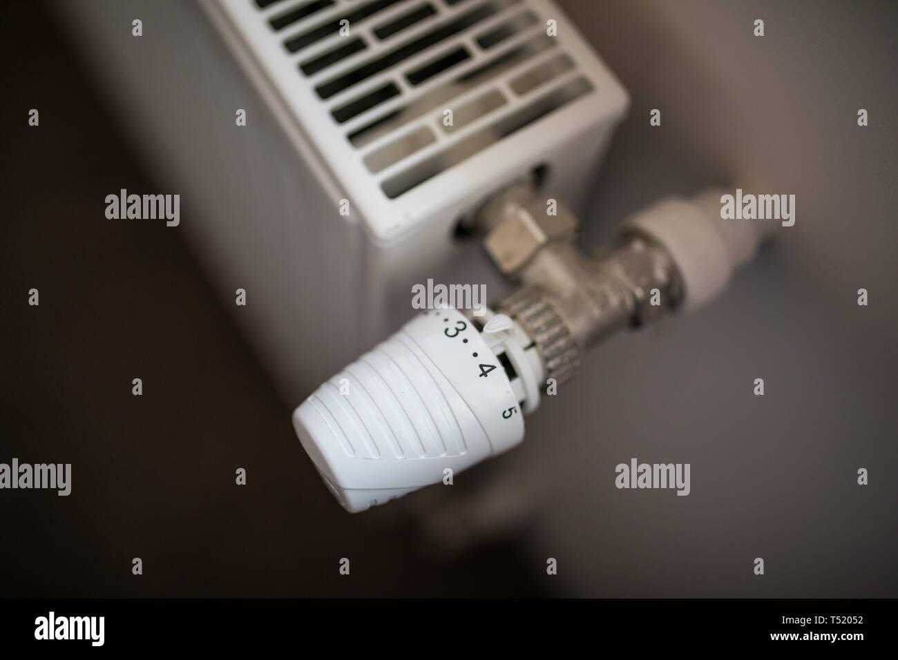 temperature knob of heating radiator Stock Photo - Alamy