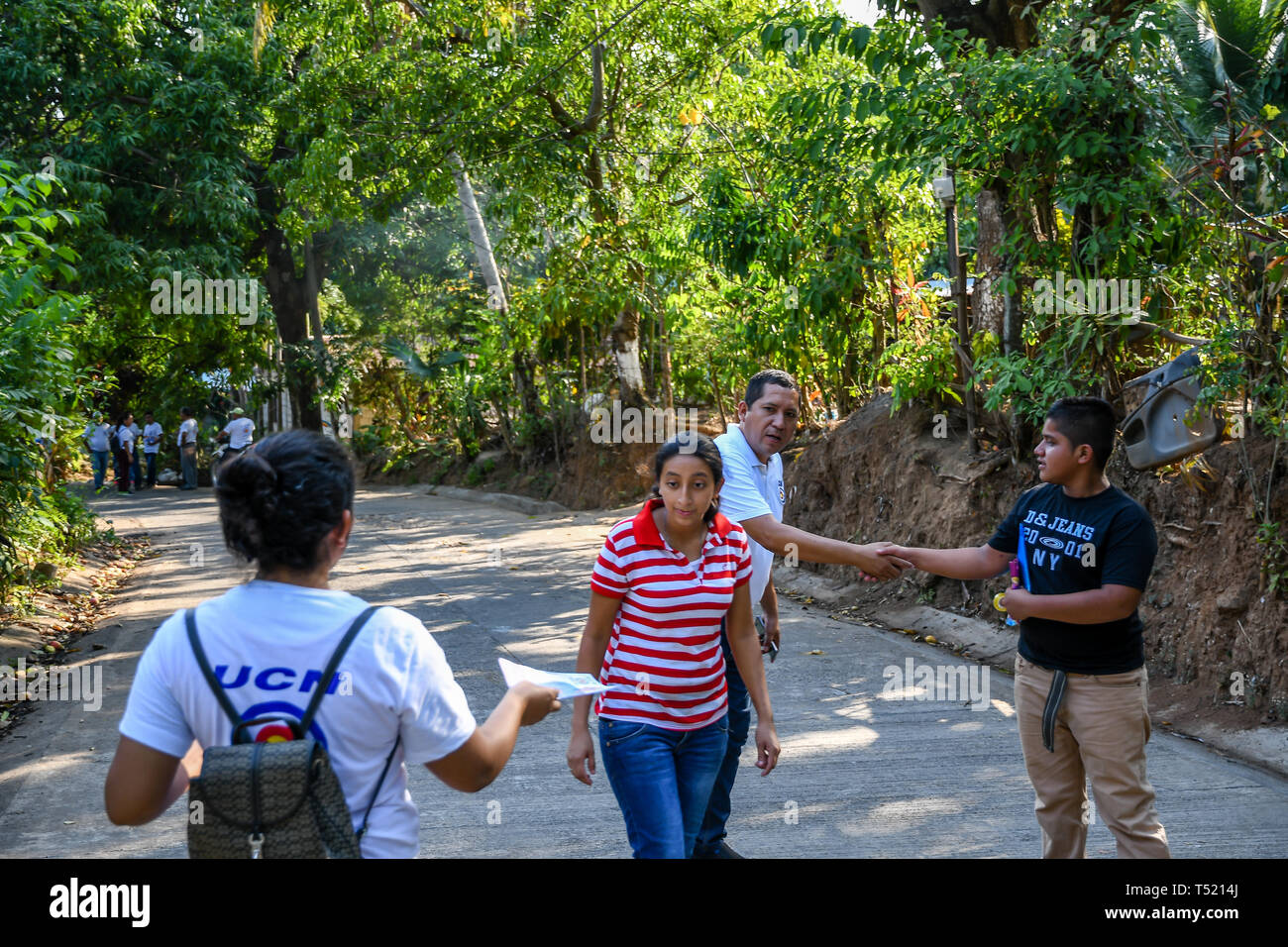 people passing out flyers in Guatemalan village Stock Photo - Alamy