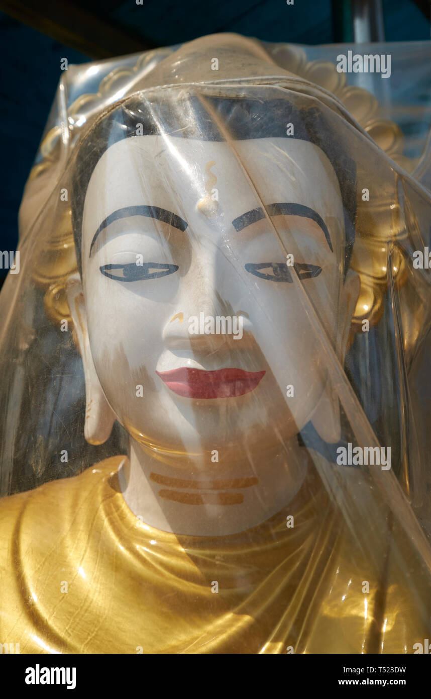 Plastic wrapped golden buddha hi-res stock photography and images - Alamy