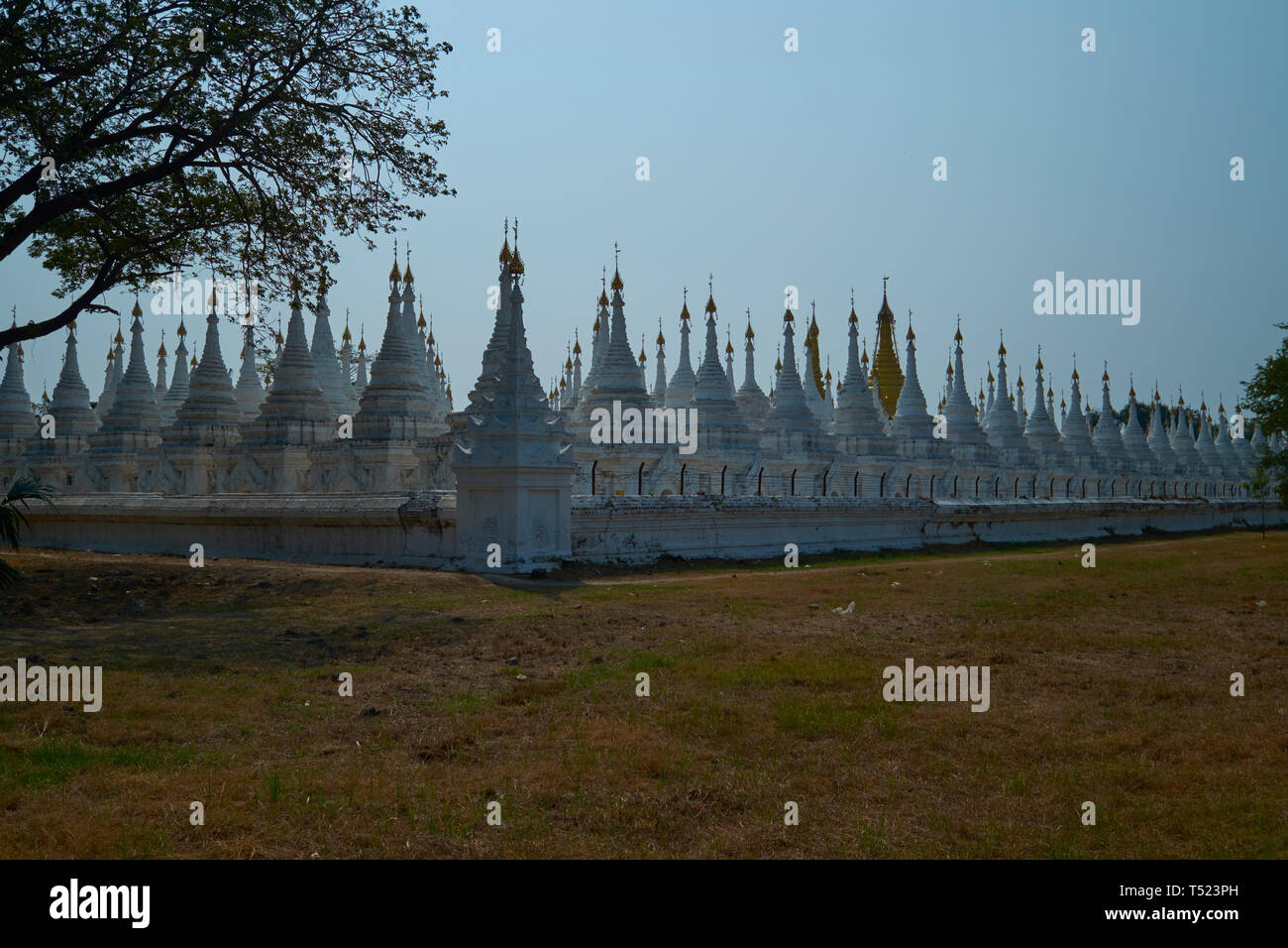 A look at the whitewashed stupas of Sandi Muni pagoda, from outside the ...
