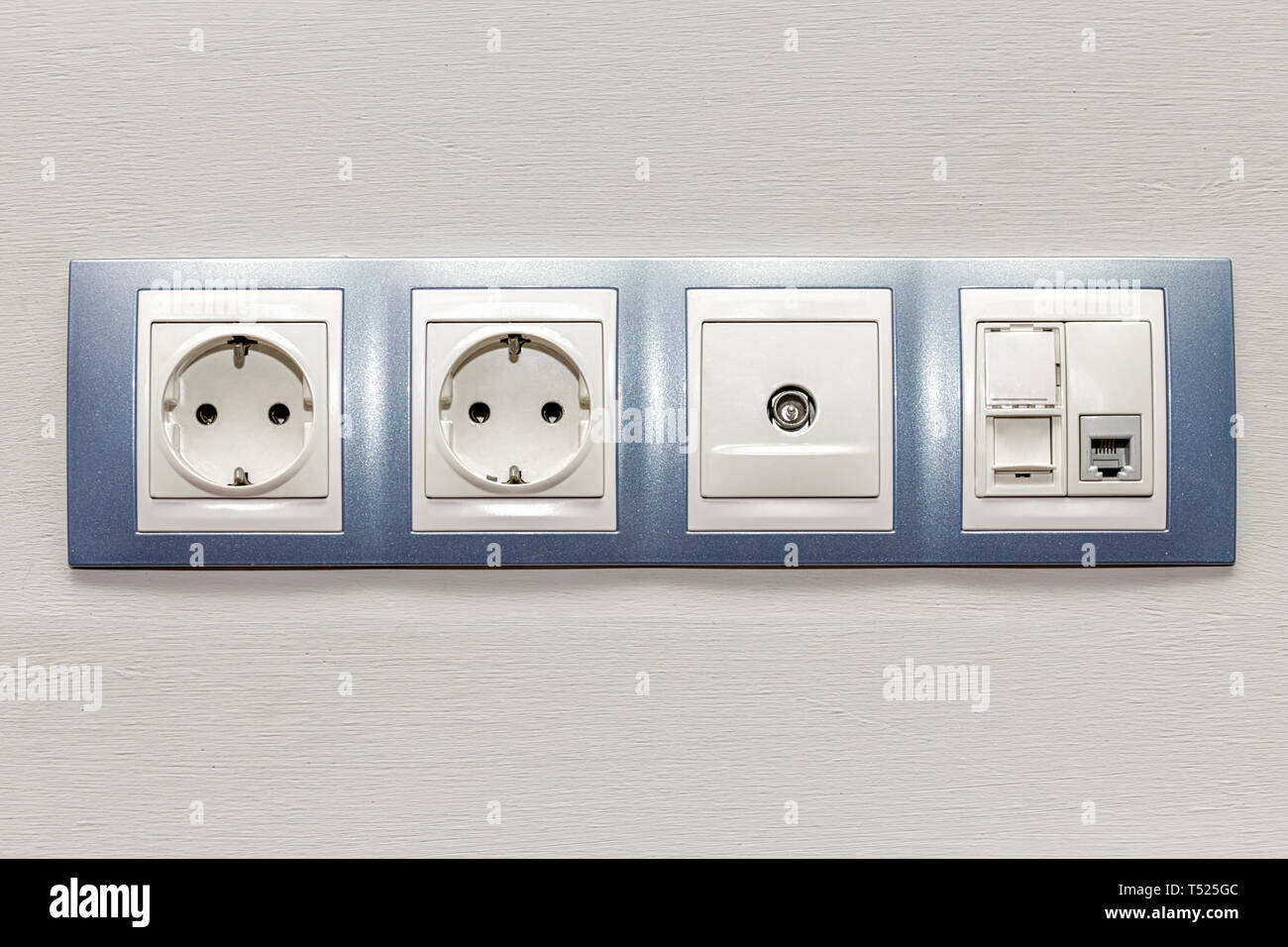 Sockets with antenna cable and internet Stock Photo - Alamy
