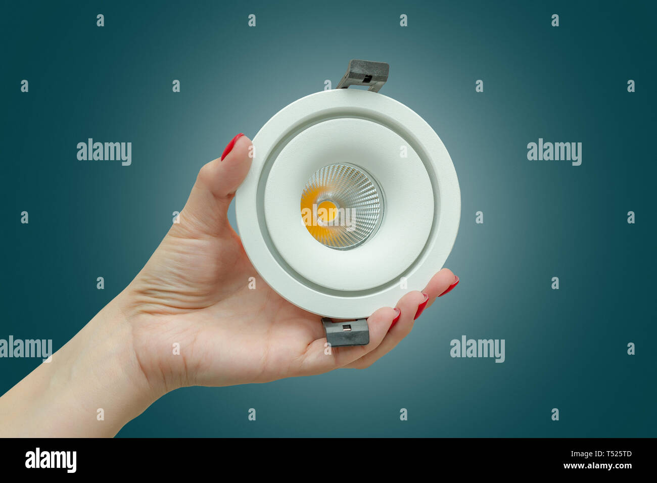 Close up woman hand holding modern Led lamp Stock Photo - Alamy