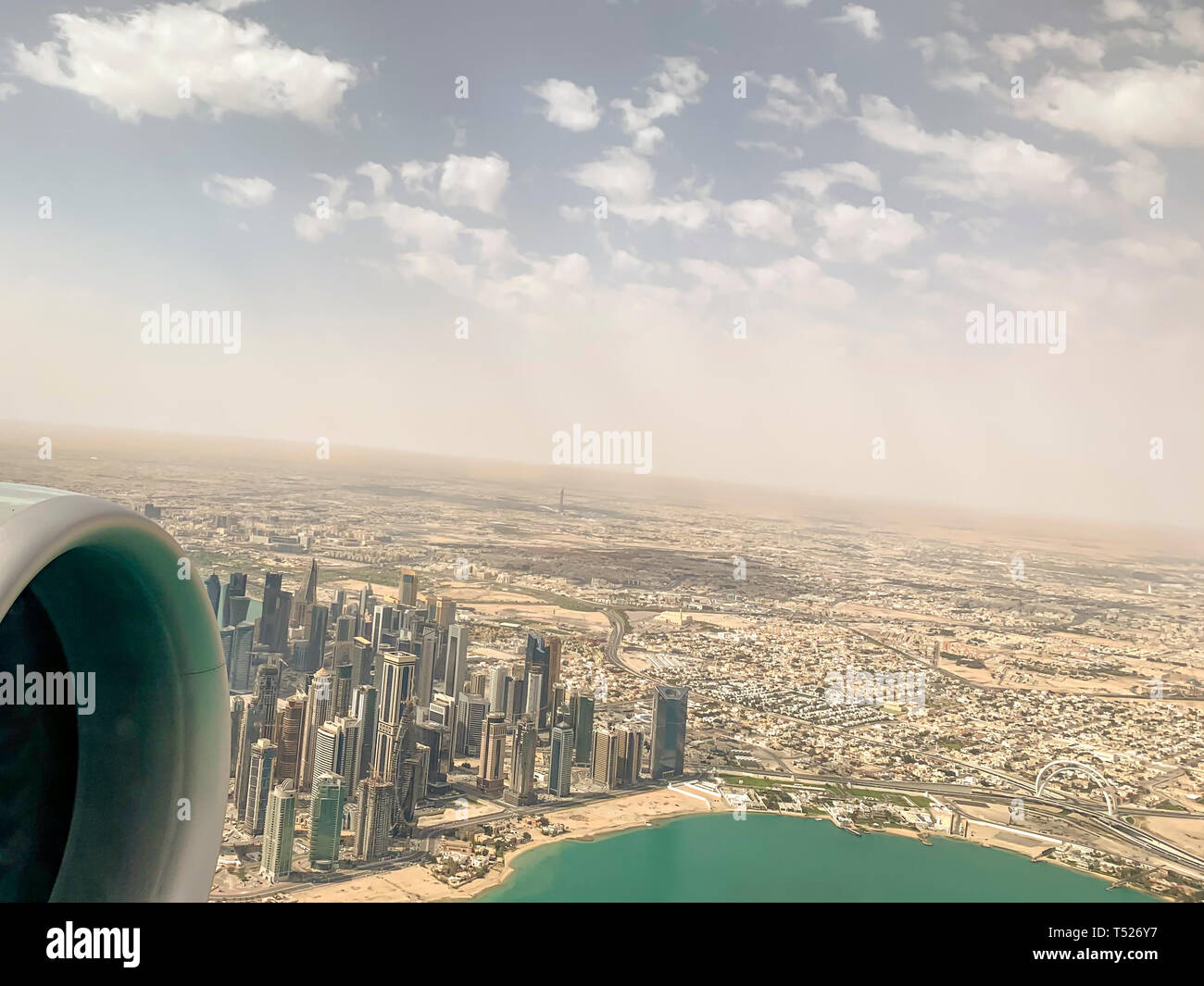 Aerial view of Doha, Qatar skyline from airplane Stock Photo - Alamy