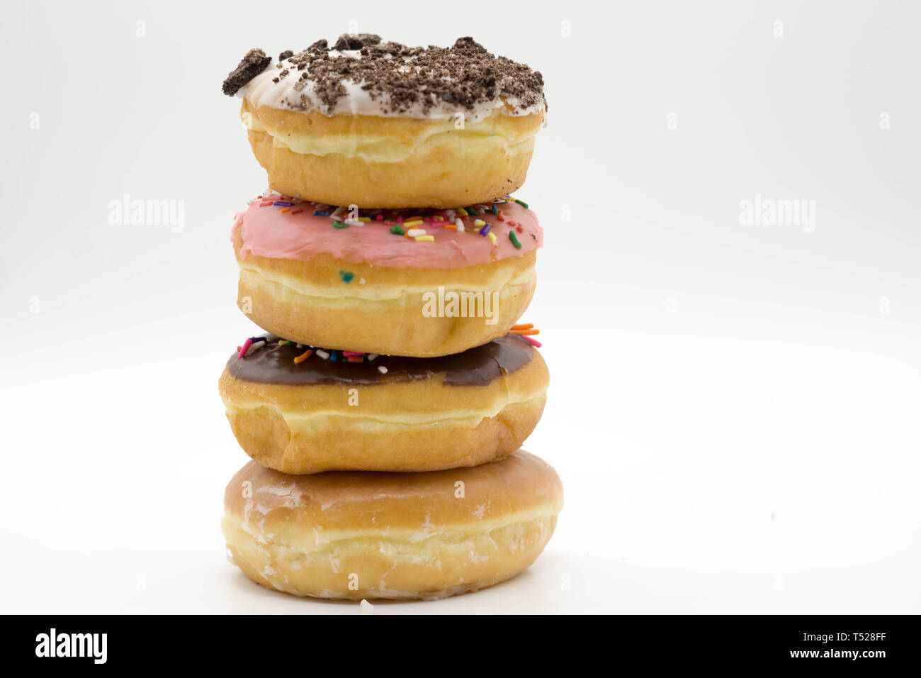 Assorted stack of delicious donuts Stock Photo - Alamy