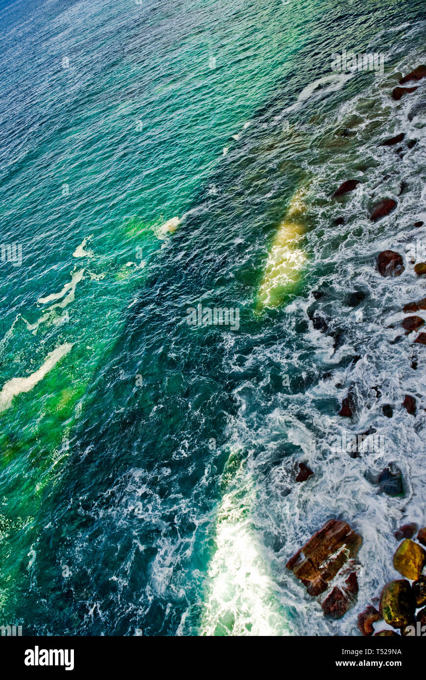 The Shadow of the Sea cliff Bridge casting a shadow on to the rocks and ...