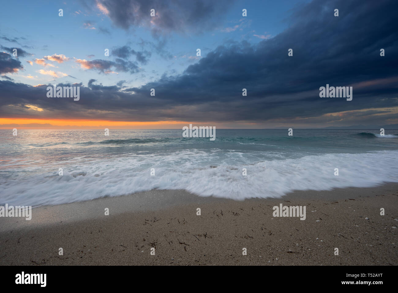 Sunset at the beach in Lefkas Greece Stock Photo - Alamy