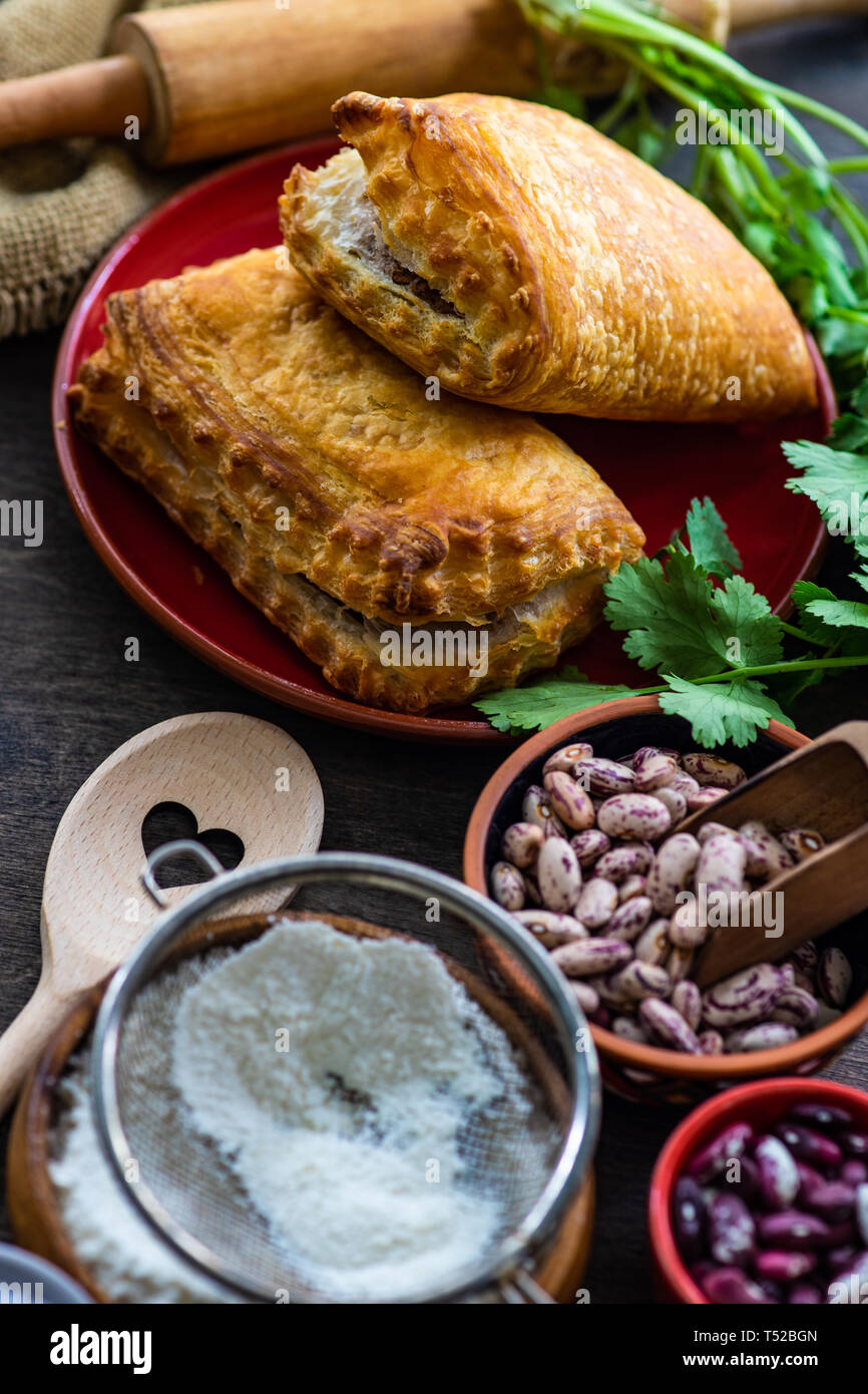 Traditional georgian lobiani pie with beans and herbs on rustic ...