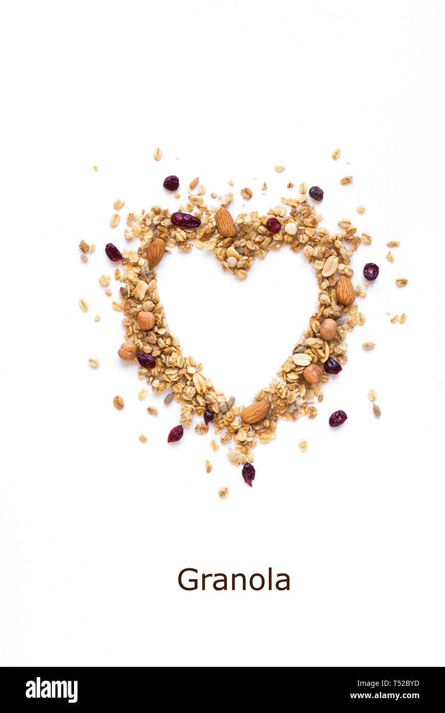 Granola in shape of Heart, creative layout isolated on white background ...