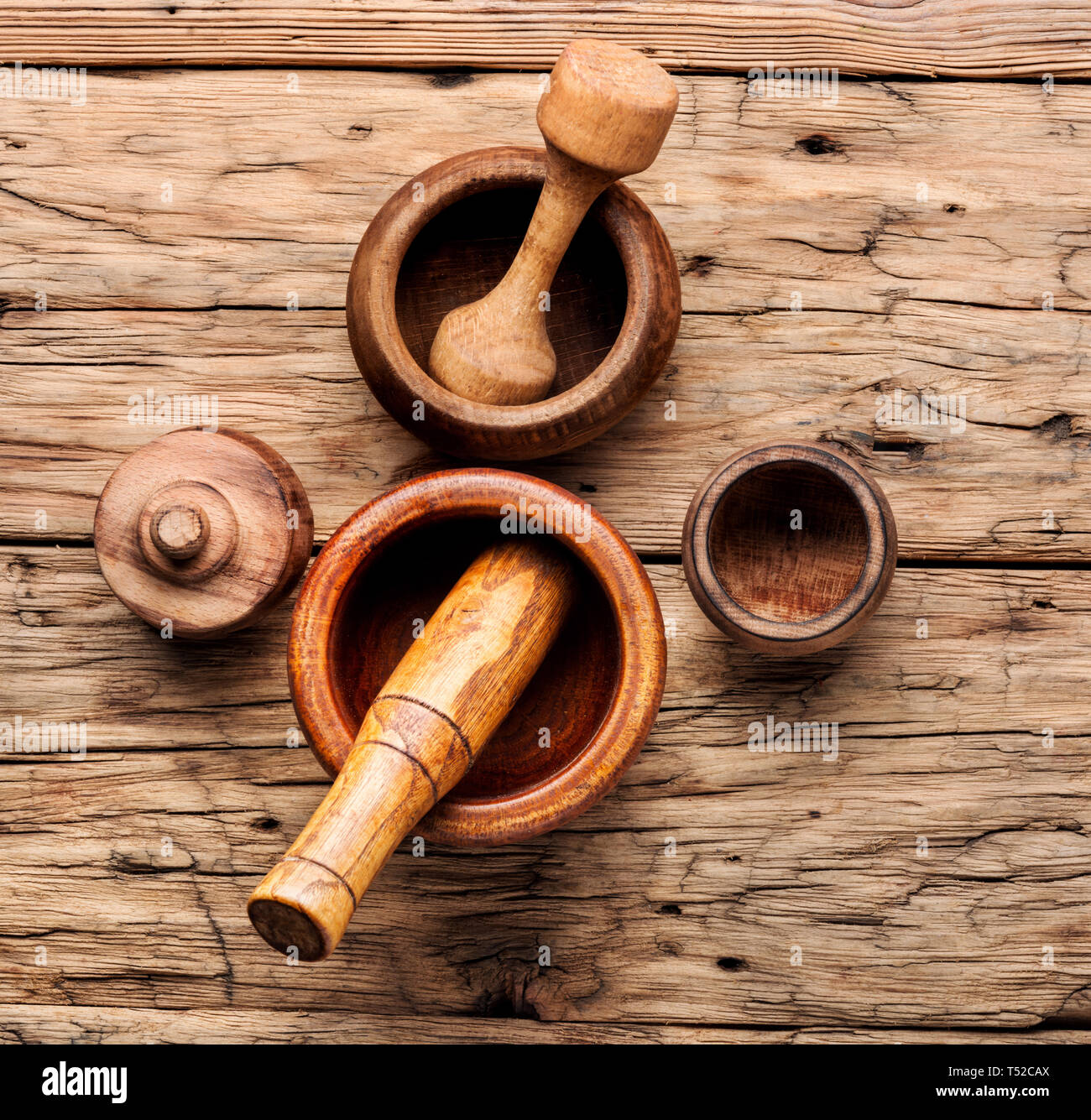 Empty wooden mortar and pestle on wooden old background.Cooking ...
