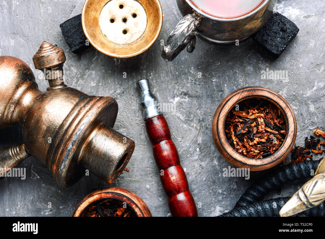 East smoking hookah. Arabian shisha with tea. Hookah and tea Stock ...