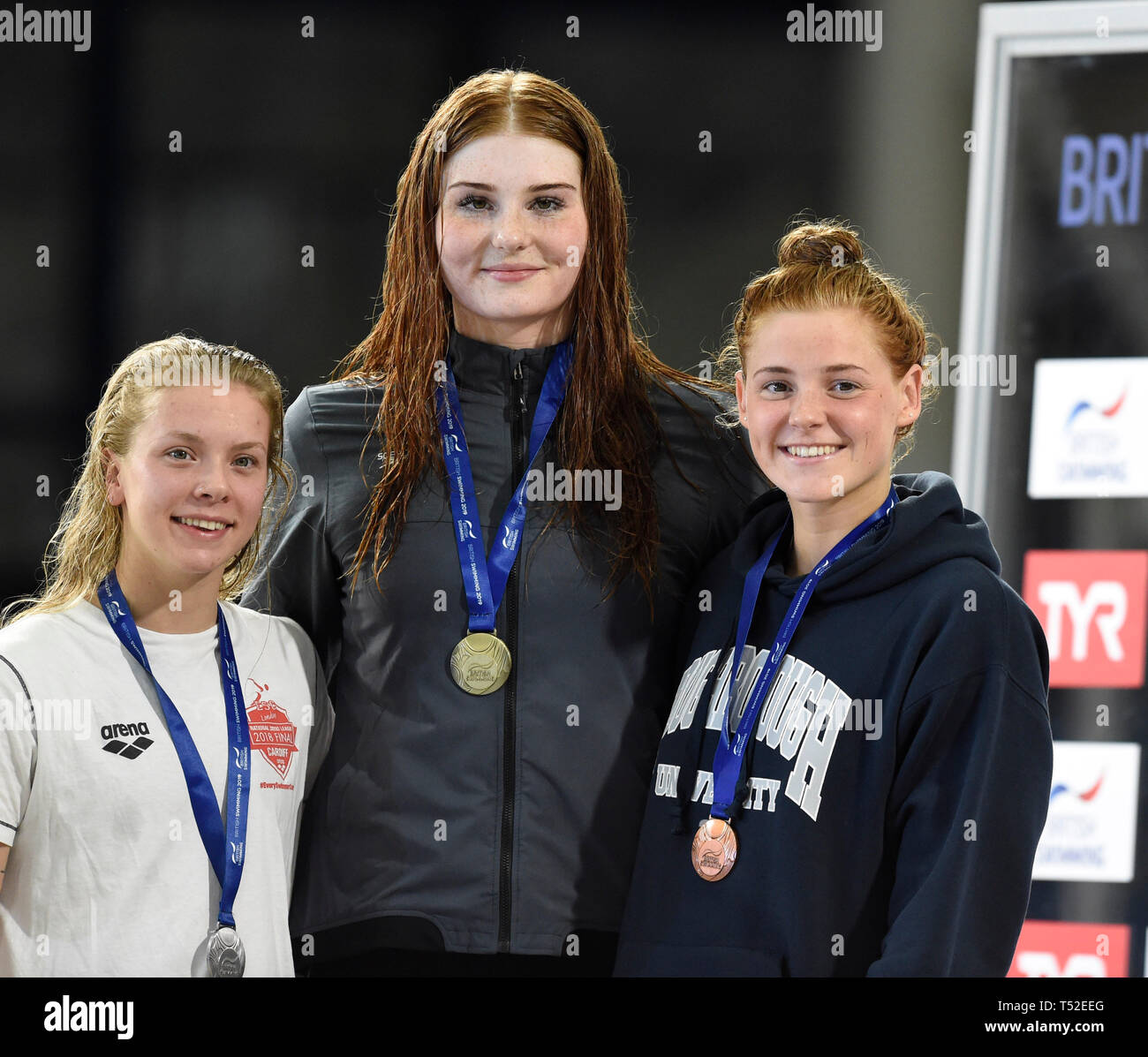 Freya Anderson (centre) with her gold medal alongside Anna Hopkin (left ...