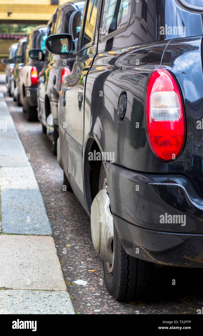 London, Great Britain. April 12, 2019. Kensington street. Cab parking ...
