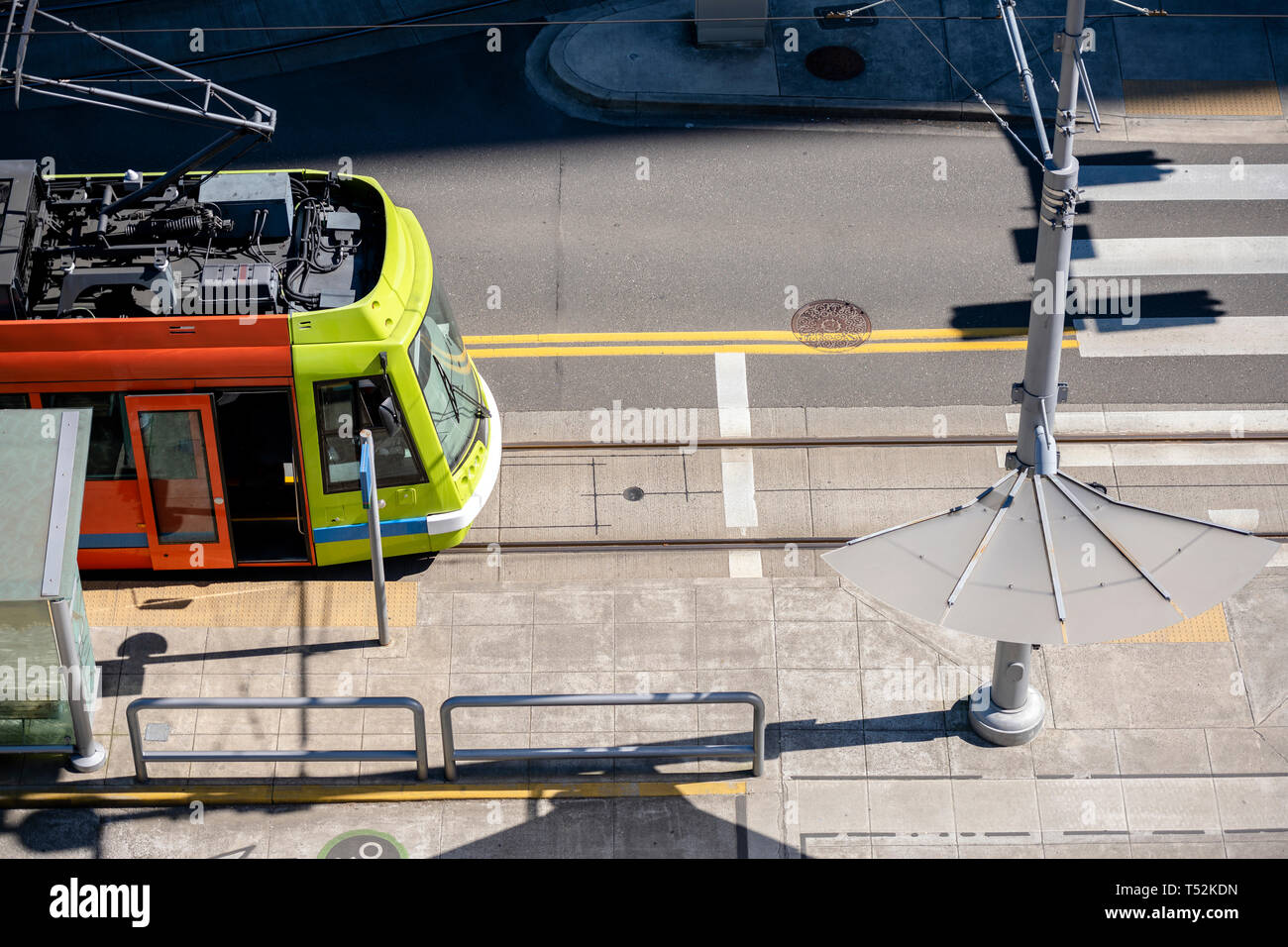 Portland Oregon local transportation streetcar carrying passengers as ...