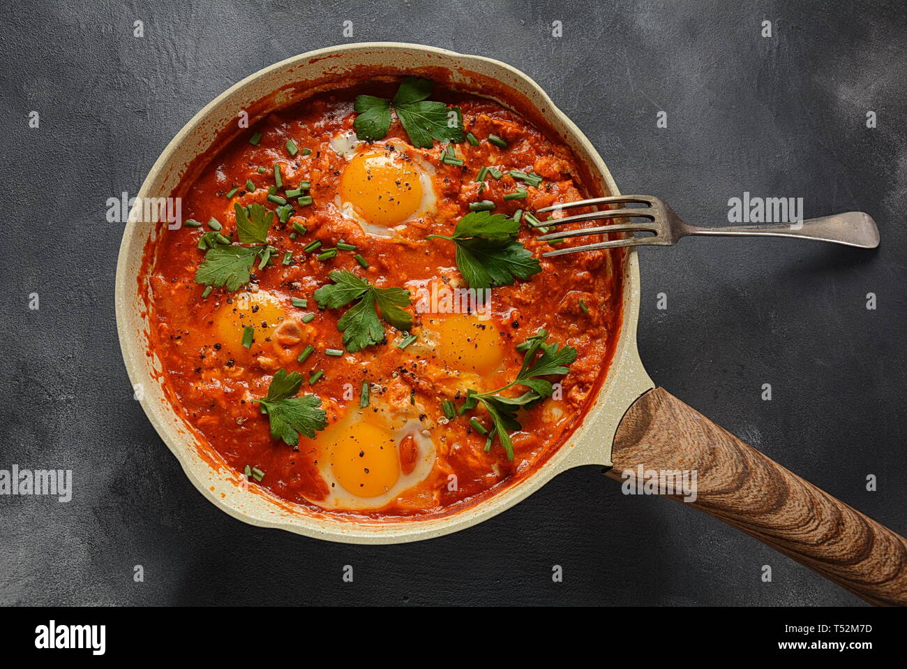 Shakshuka , middle eastern traditional homemade breakfast- fried eggs ...