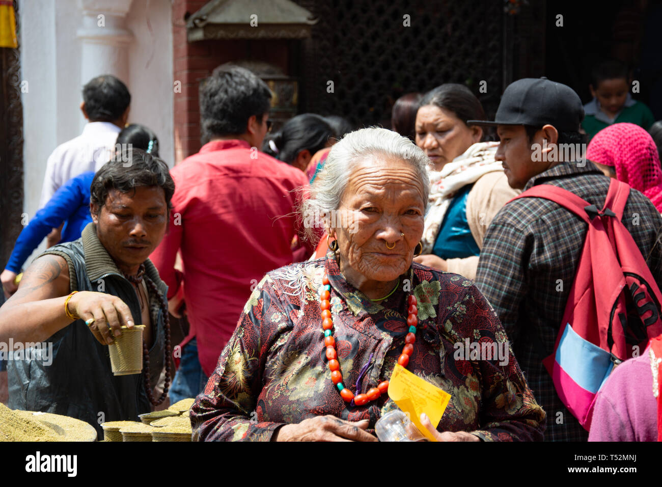 Kathmandu, Nepal - May 10, 2017: A buddhist devotee in traditional ...