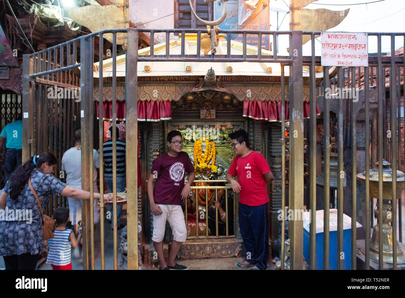 Kathmandu, Nepal - June 02, 2017: Devotees at the temple of Lord Ganesh ...