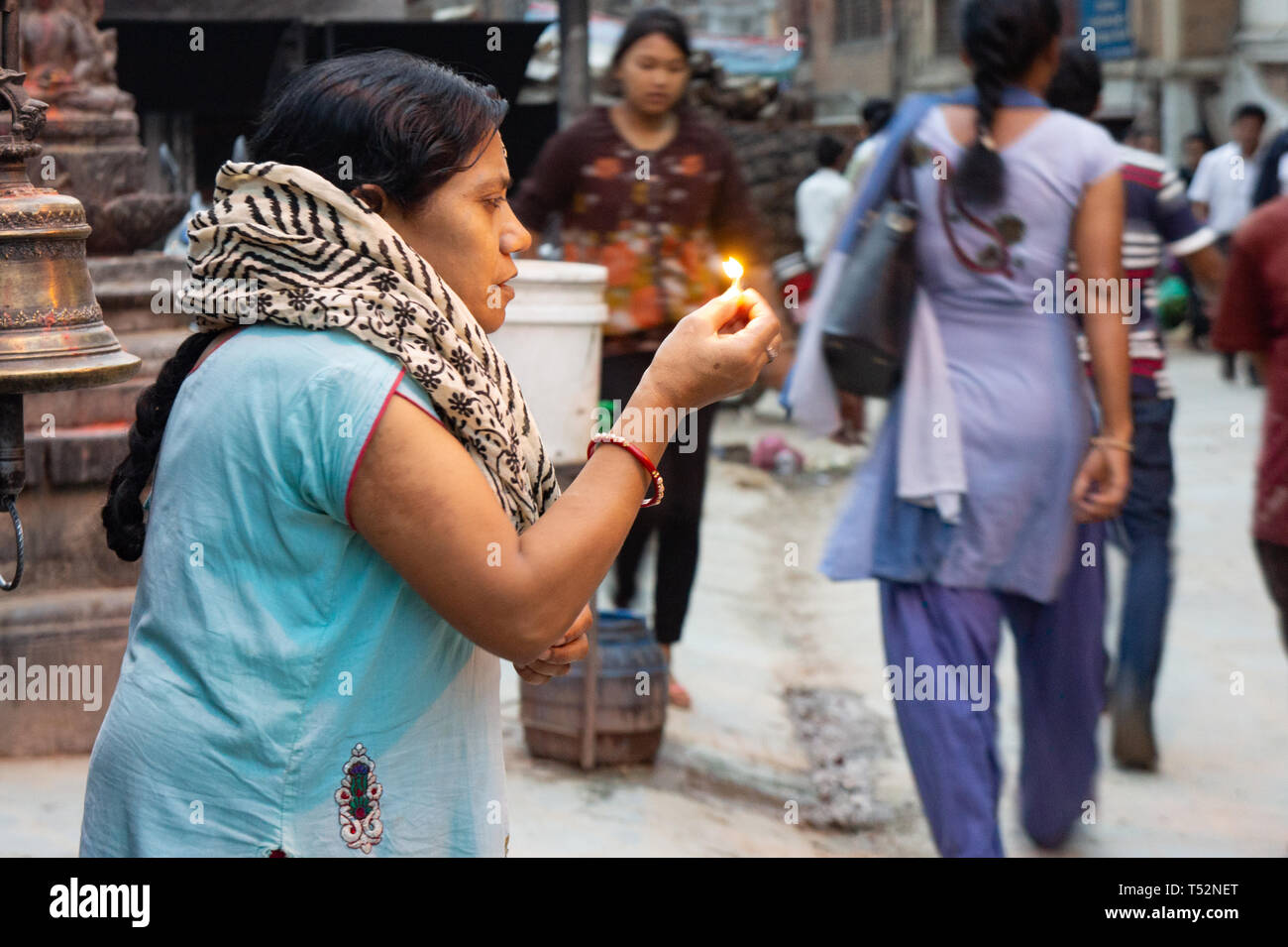 Kathmandu, Nepal - June 02, 2017: Female devotee pays her homage to ...