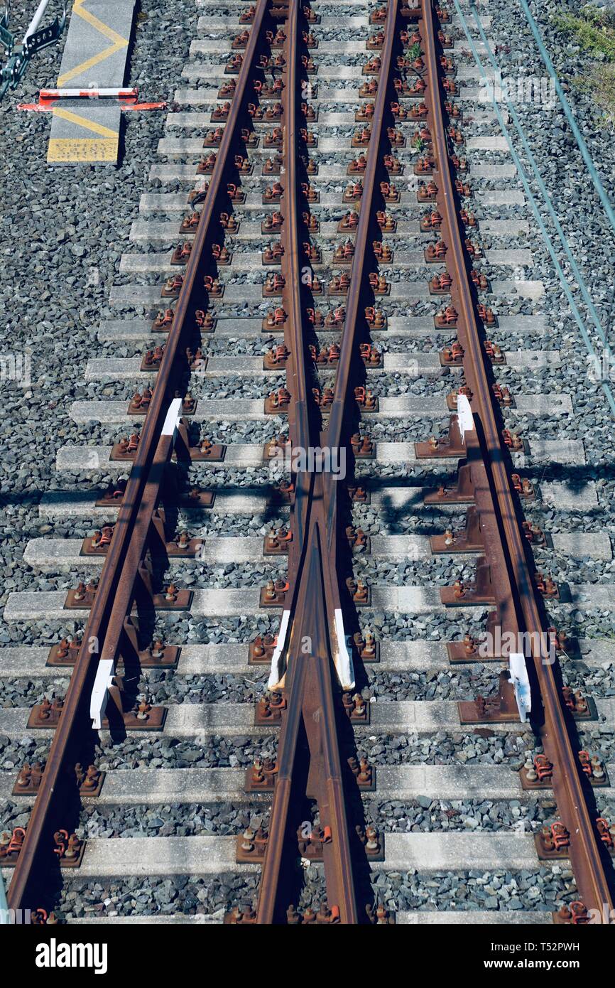 old raildroad track in the station on the street Stock Photo - Alamy
