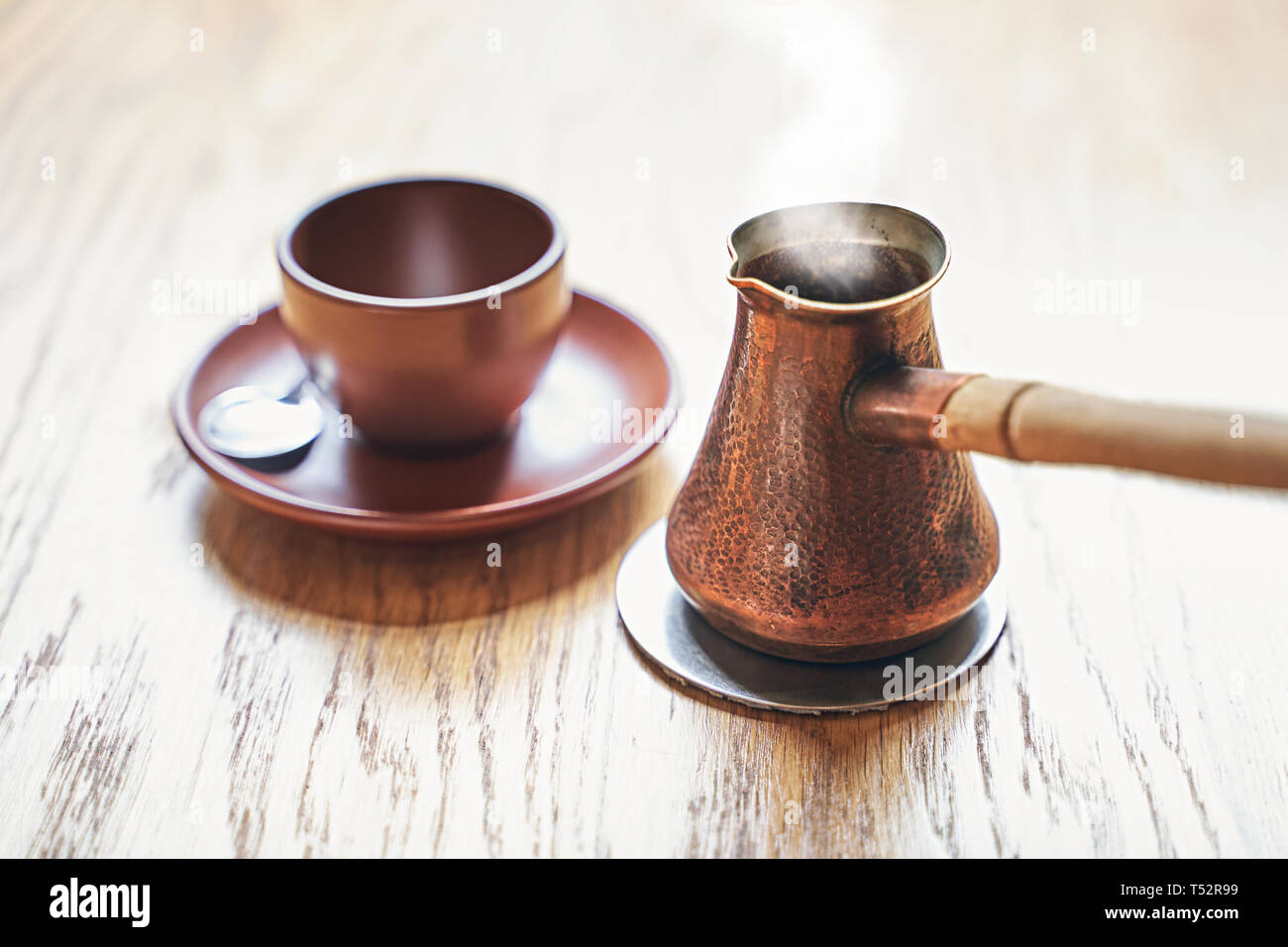 Coffee in oriental Turkish style served in cezve, a small long-handled ...