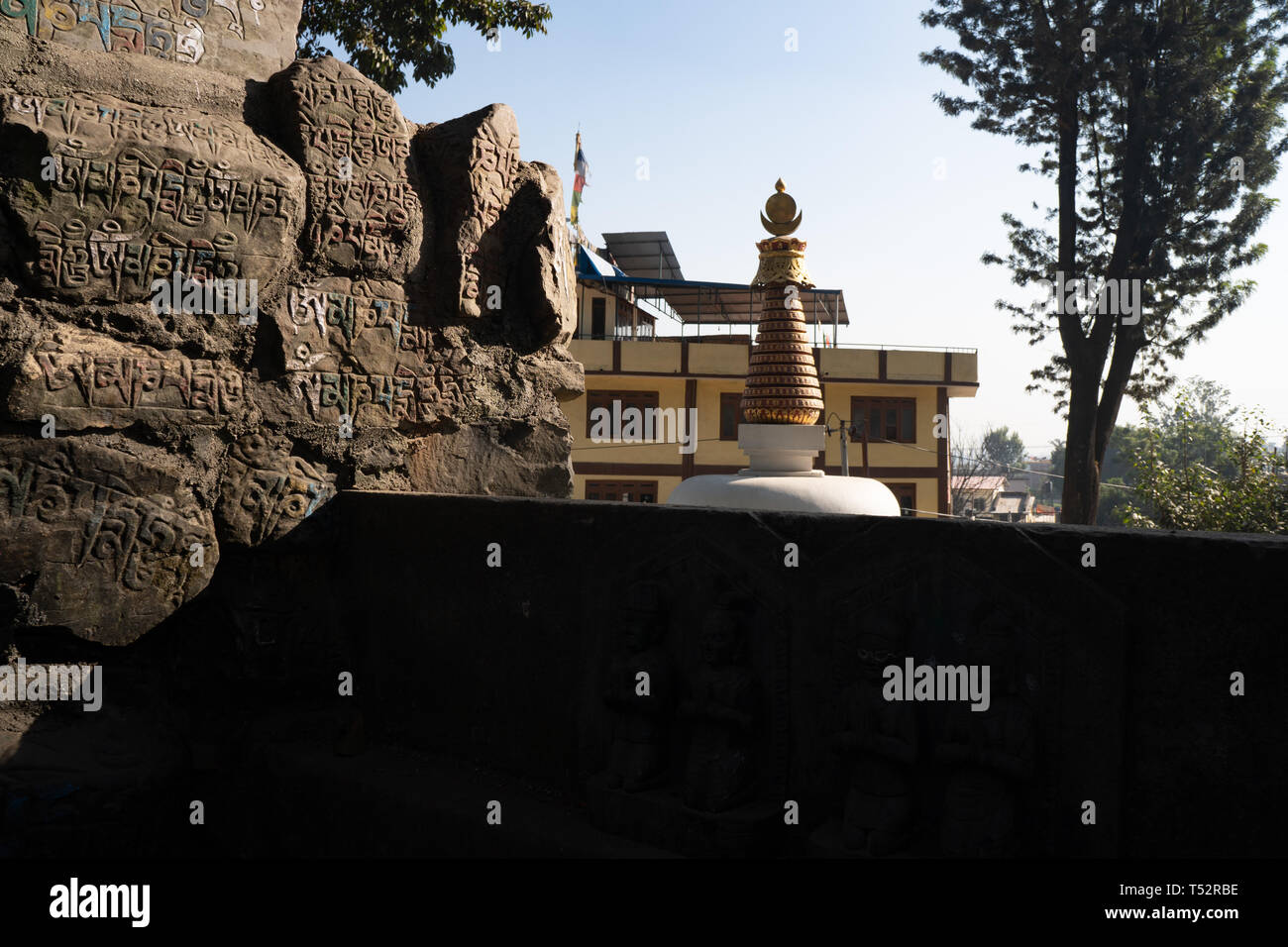 Buddhist holy words carved on rocks in front of a Buddhist monastery at ...