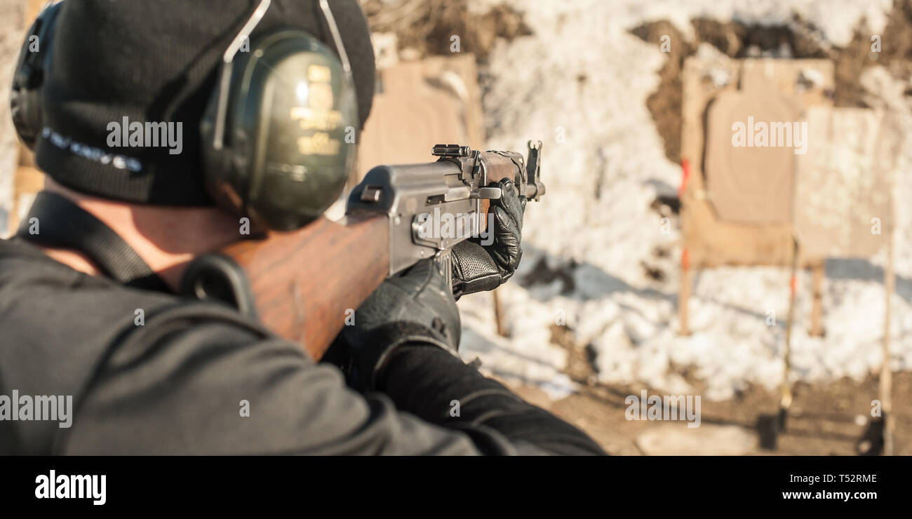 Civilian shooting training from rifle machine gun on outdoor shooting ...