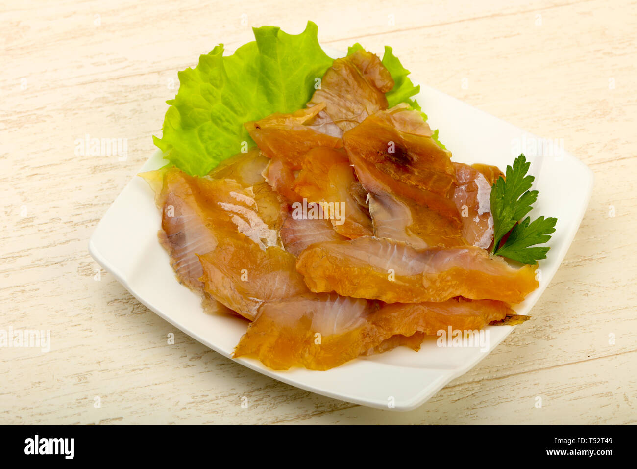 Smoked catfish fillet carpaccio Stock Photo - Alamy