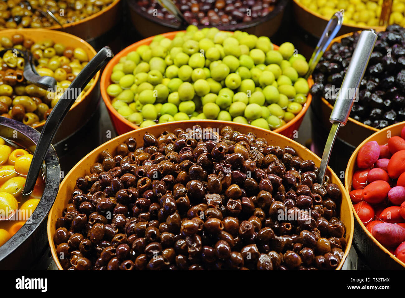 Colorful bowls of marinated olives at a food market Stock Photo - Alamy