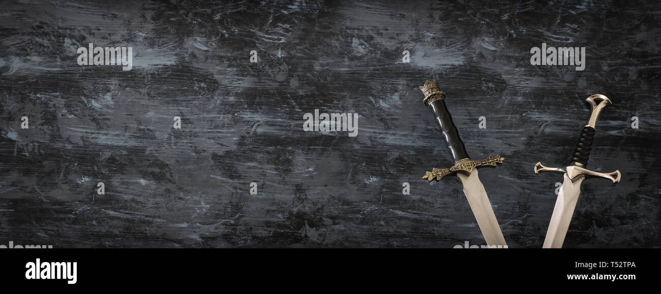 low key banner of silver sword. fantasy medieval period Stock Photo - Alamy