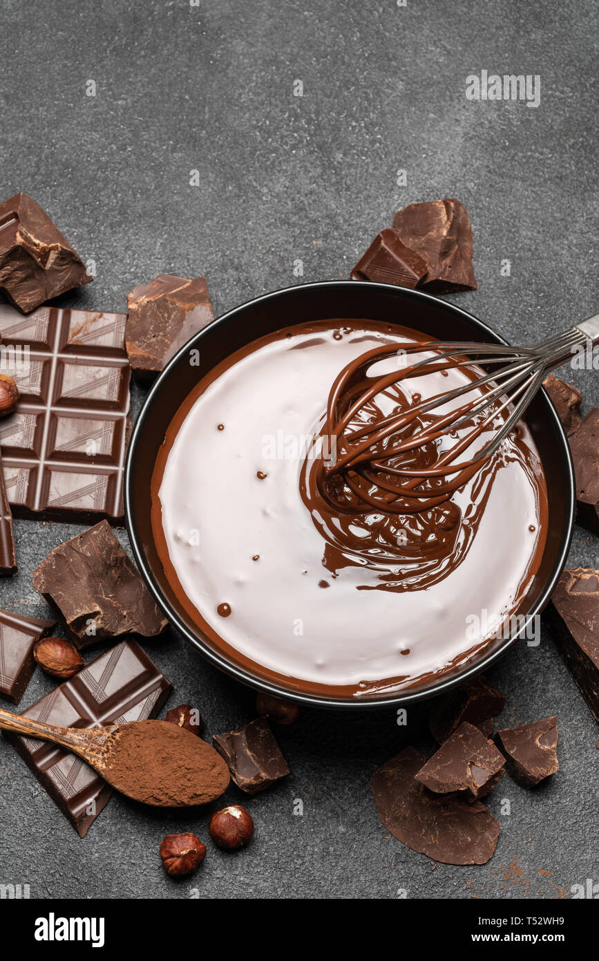 ceramic bowl of chocolate cream or melted chocolate and pieces of ...