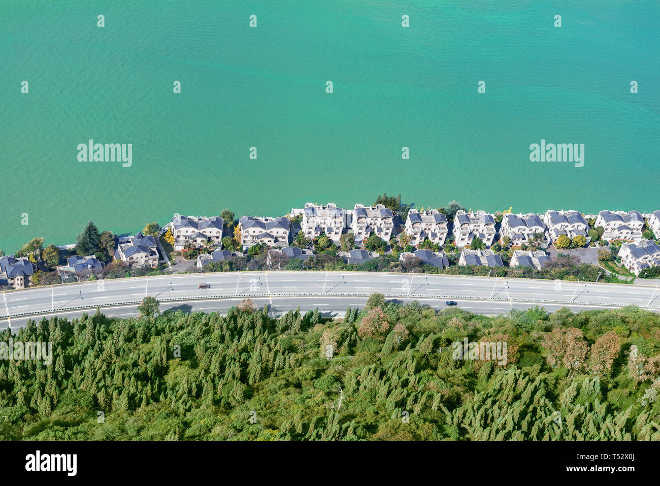 Aerial view of the road and rich houses by Dianchi lake. Kunming. China ...