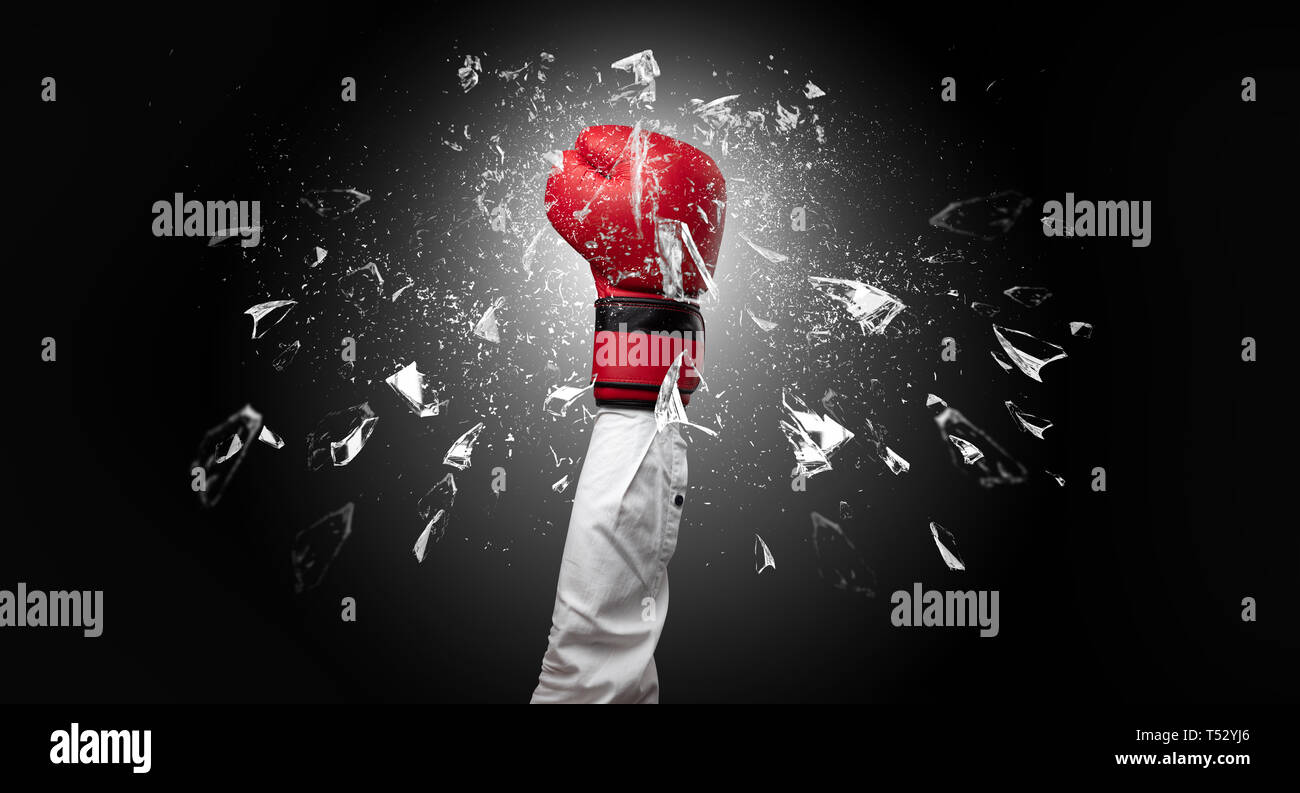 Big hand hits intense and breaks glasses Stock Photo - Alamy