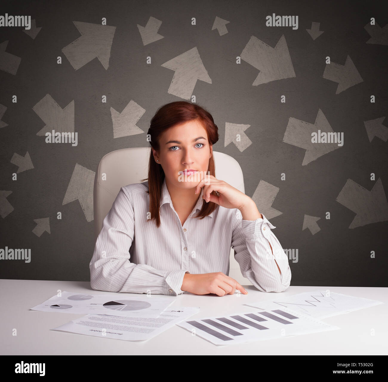Manager in front of the office desk with different direction concept ...