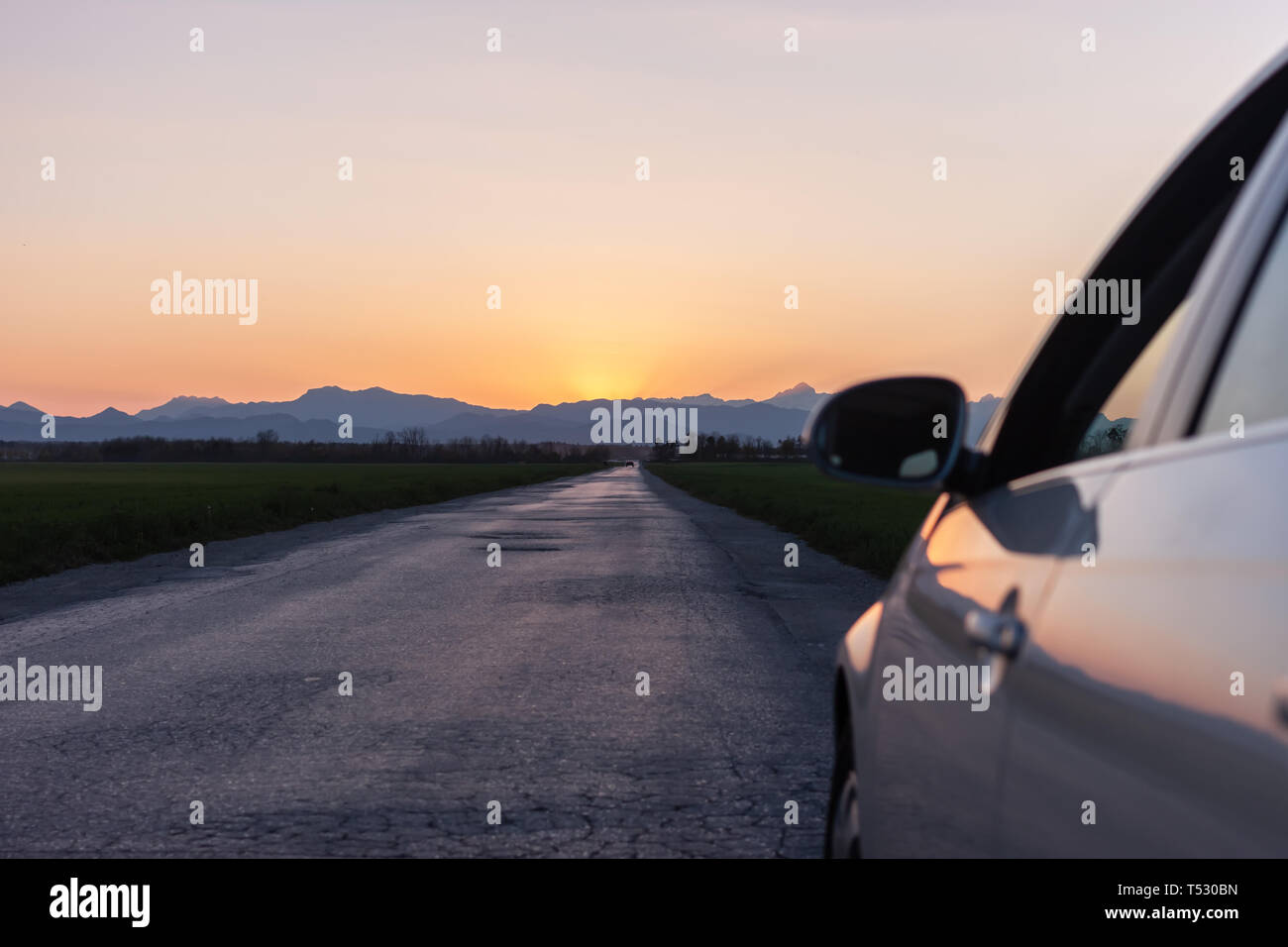 evening road heading to sunset horizon view from car Stock Photo - Alamy
