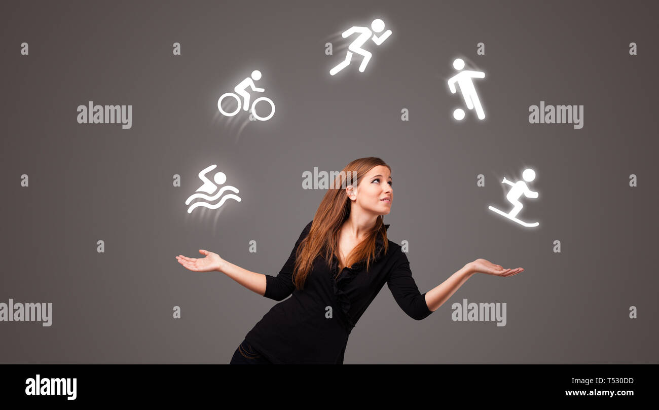 Young student juggle with sports concept Stock Photo - Alamy