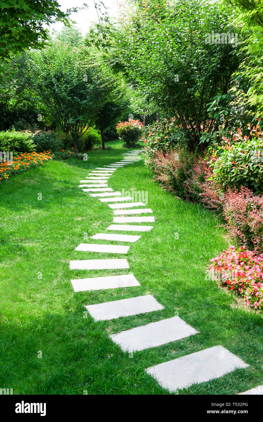 A winding path in the garden Stock Photo - Alamy