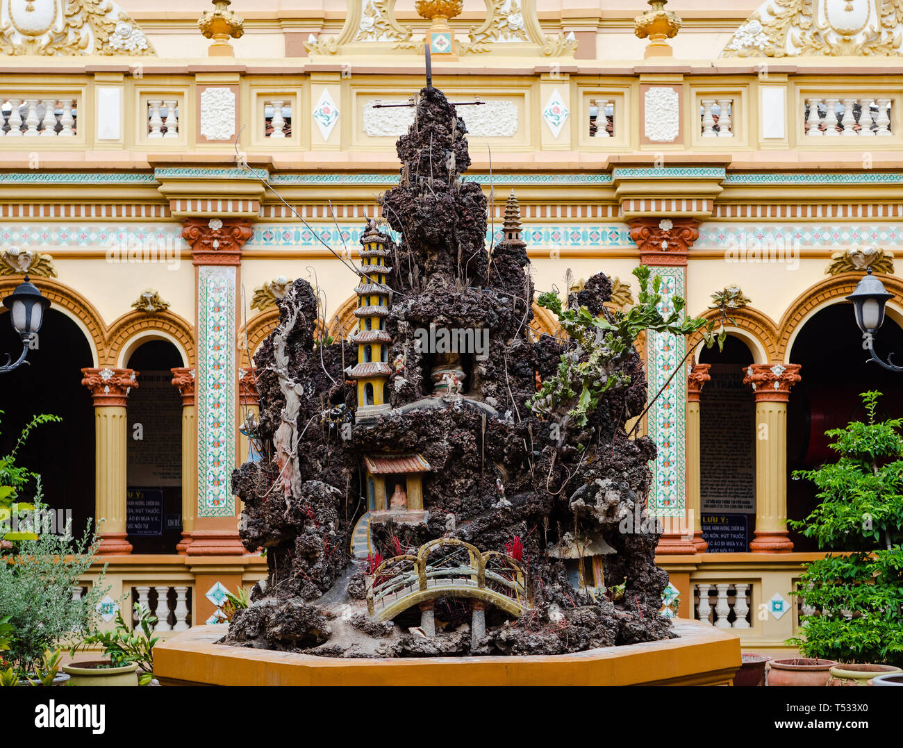 Hon non bo, a miniature mountain landscape, at the Vinh Trang Temple ...