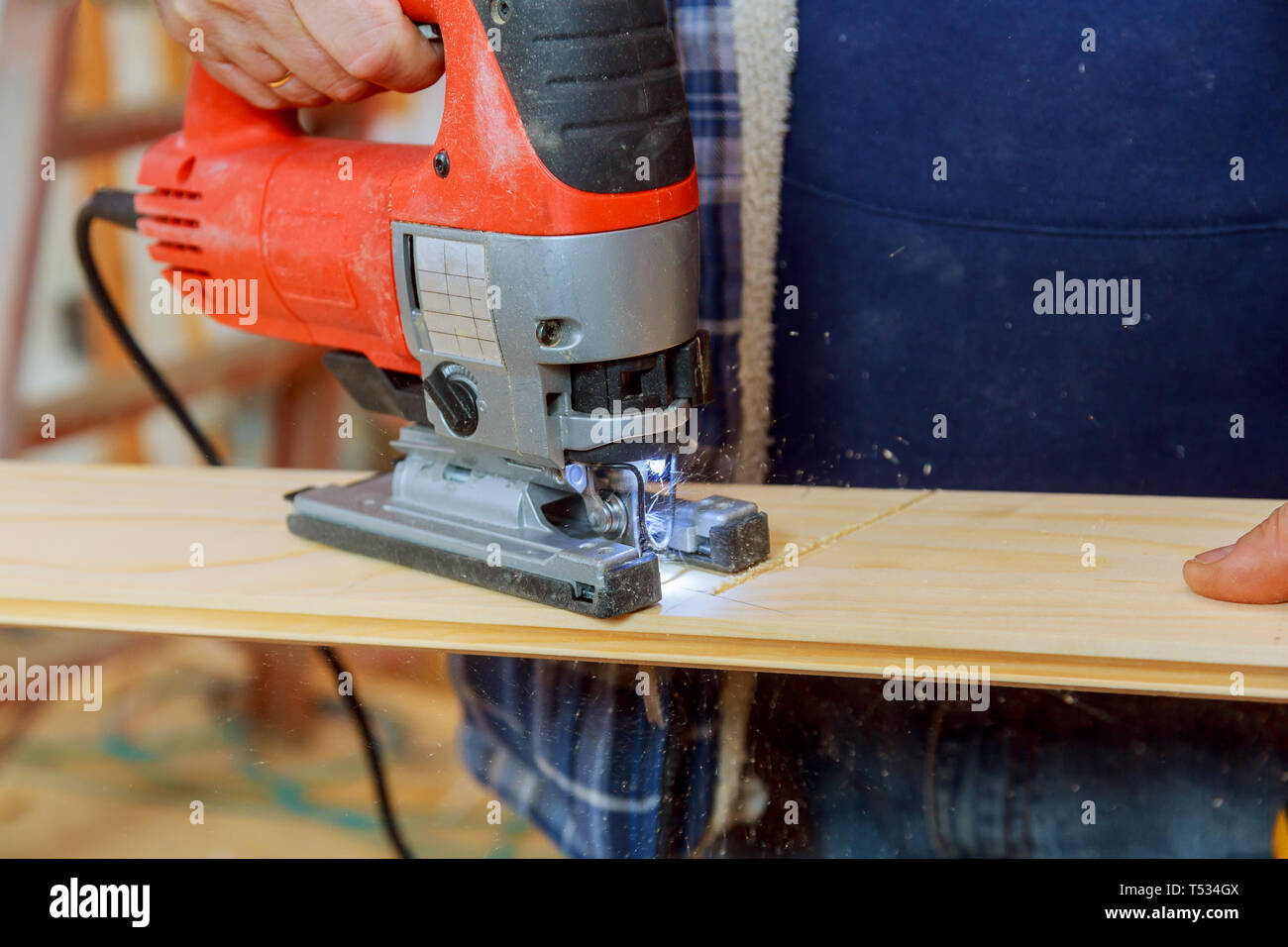 Sawing wooden plank jig saw hi-res stock photography and images - Alamy