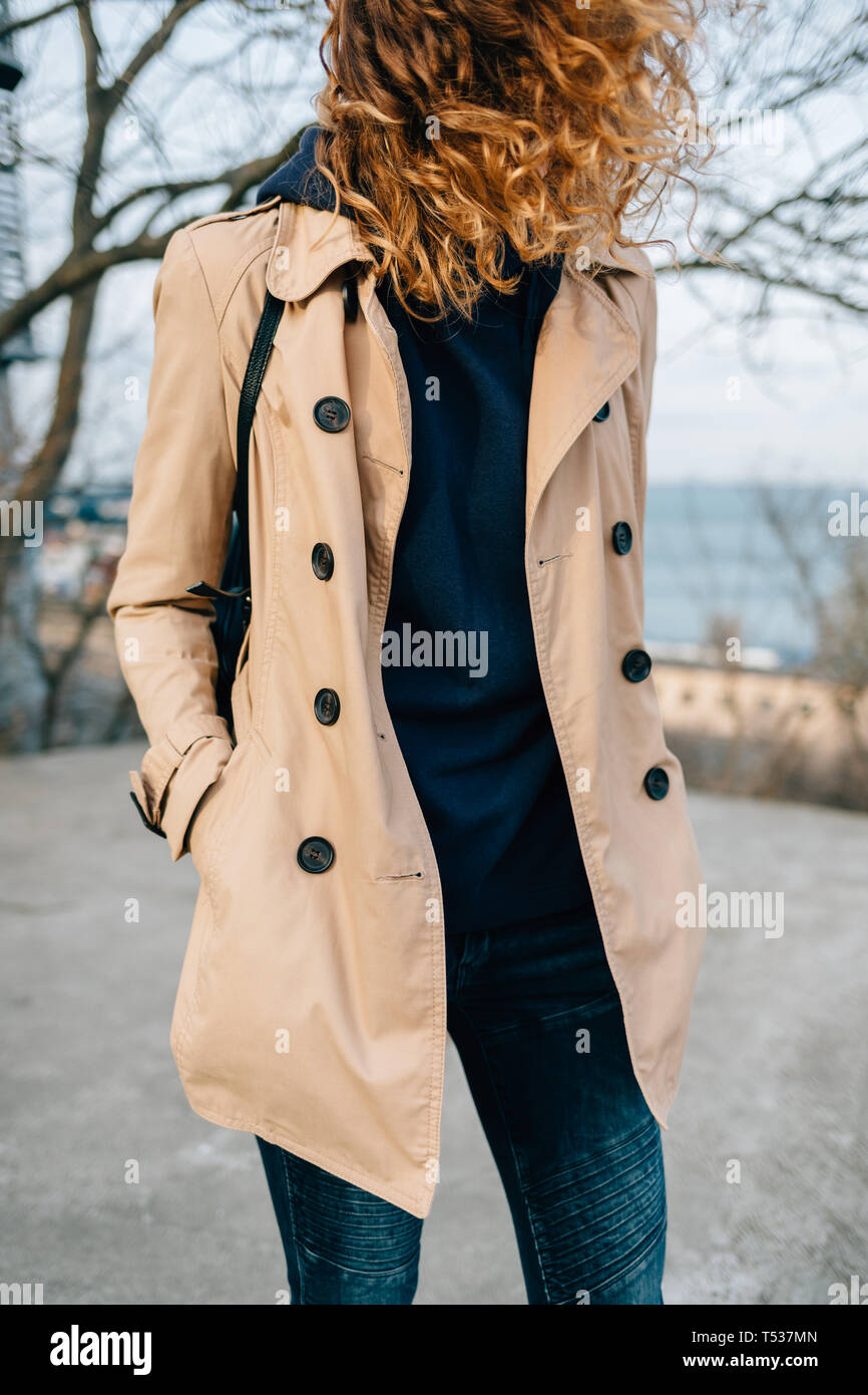 Female trench coat wind hi-res stock photography and images - Alamy