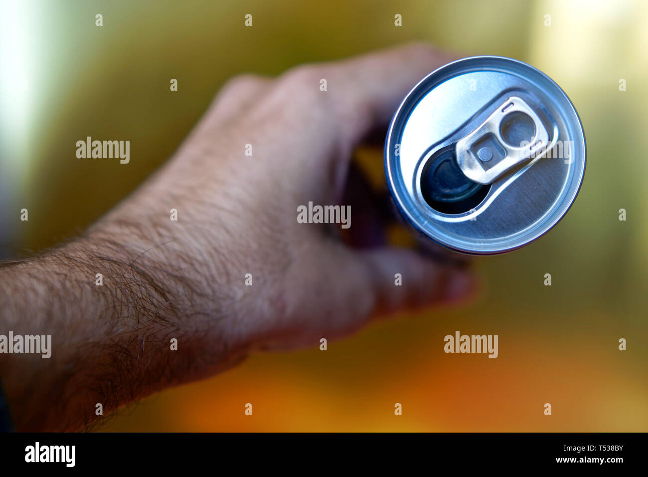 Man holding beer can hi-res stock photography and images - Alamy