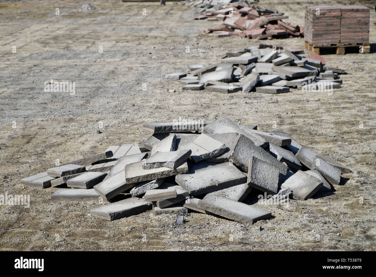 Old paving slabs dismantled from a city street during reconstruction ...