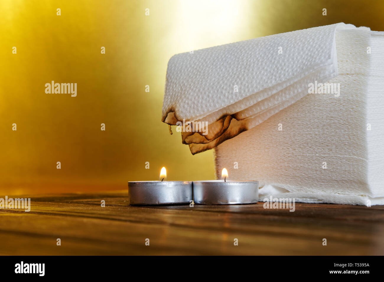 Fire hazard candle hi-res stock photography and images - Alamy