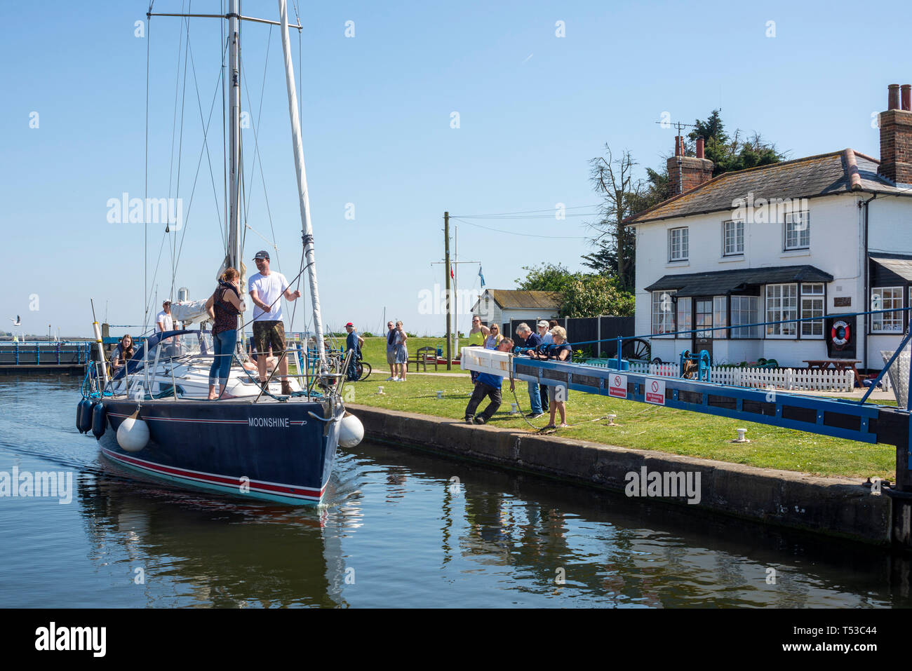Yacht named Moonshine in Heybridge Basin lock, Essex, UK, entering the ...