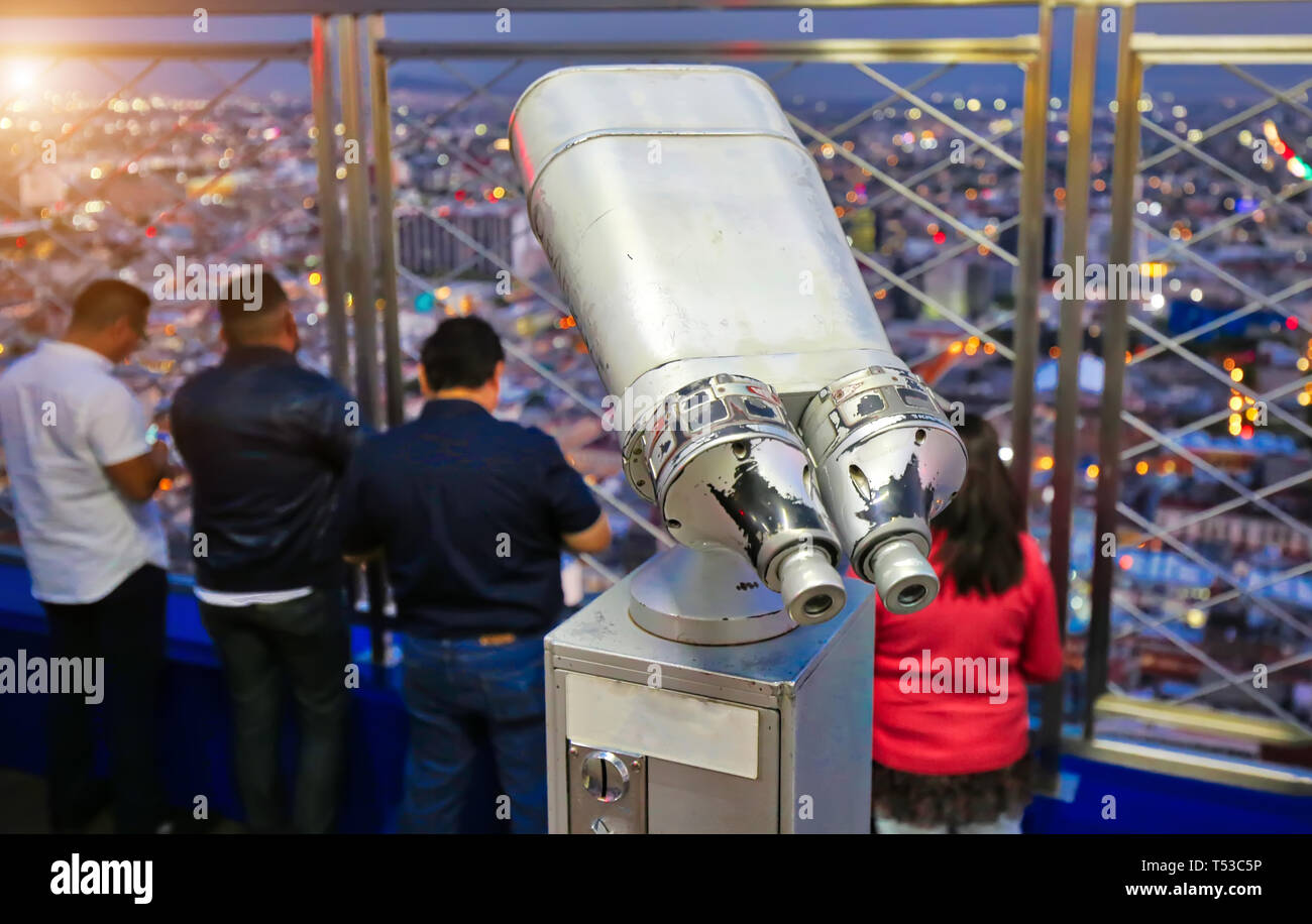 People enjoying panoramic view of Mexico City from the observation deck ...