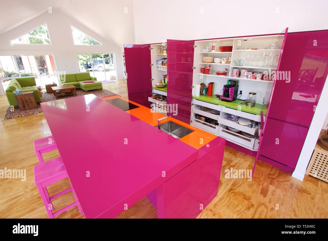 Magenta pink orange kitchen Stock Photo - Alamy