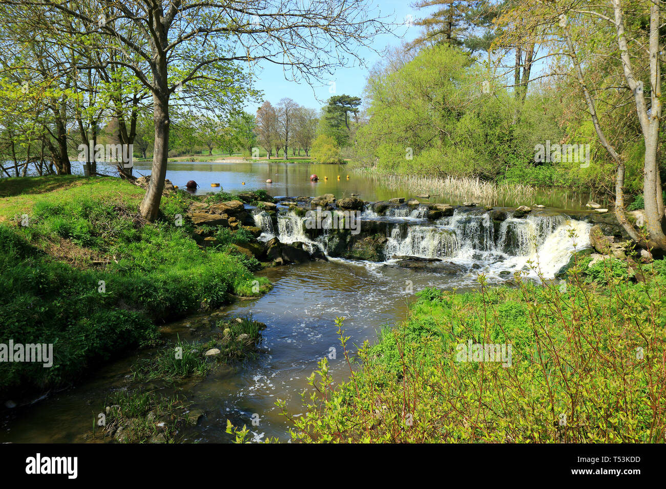 A small waterfall flowing from a lake in Kent Stock Photo - Alamy