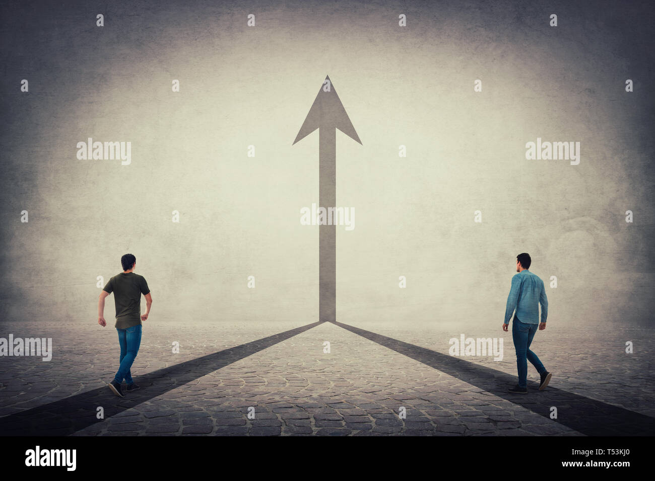 Two men walking on a pavement road and pathways join together and ...