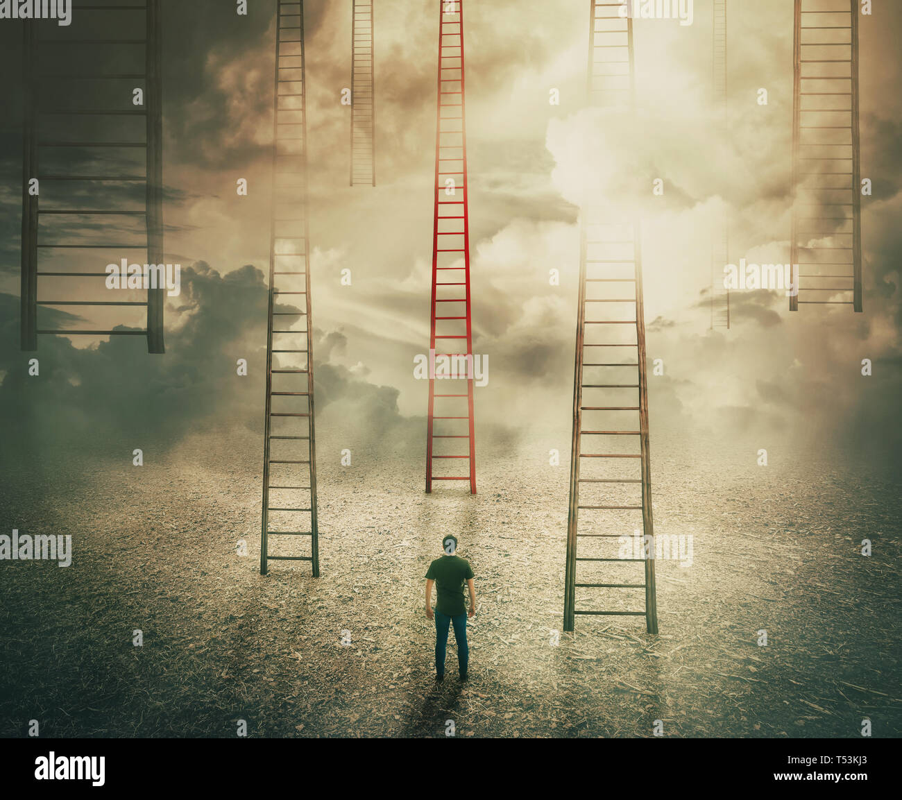 Man standing in front of huge ladders going up to the sky. Choosing a ...